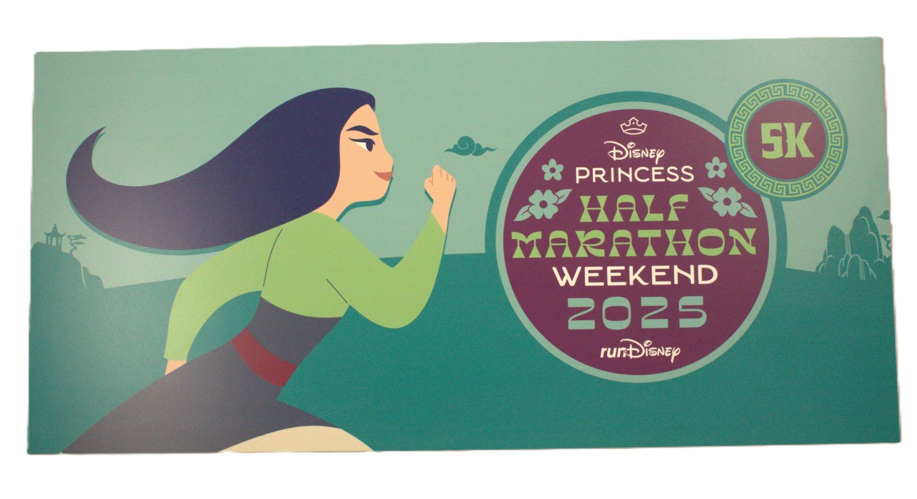 A 2025 runDisney Princess Half Marathon Weekend 5K Event Sign.