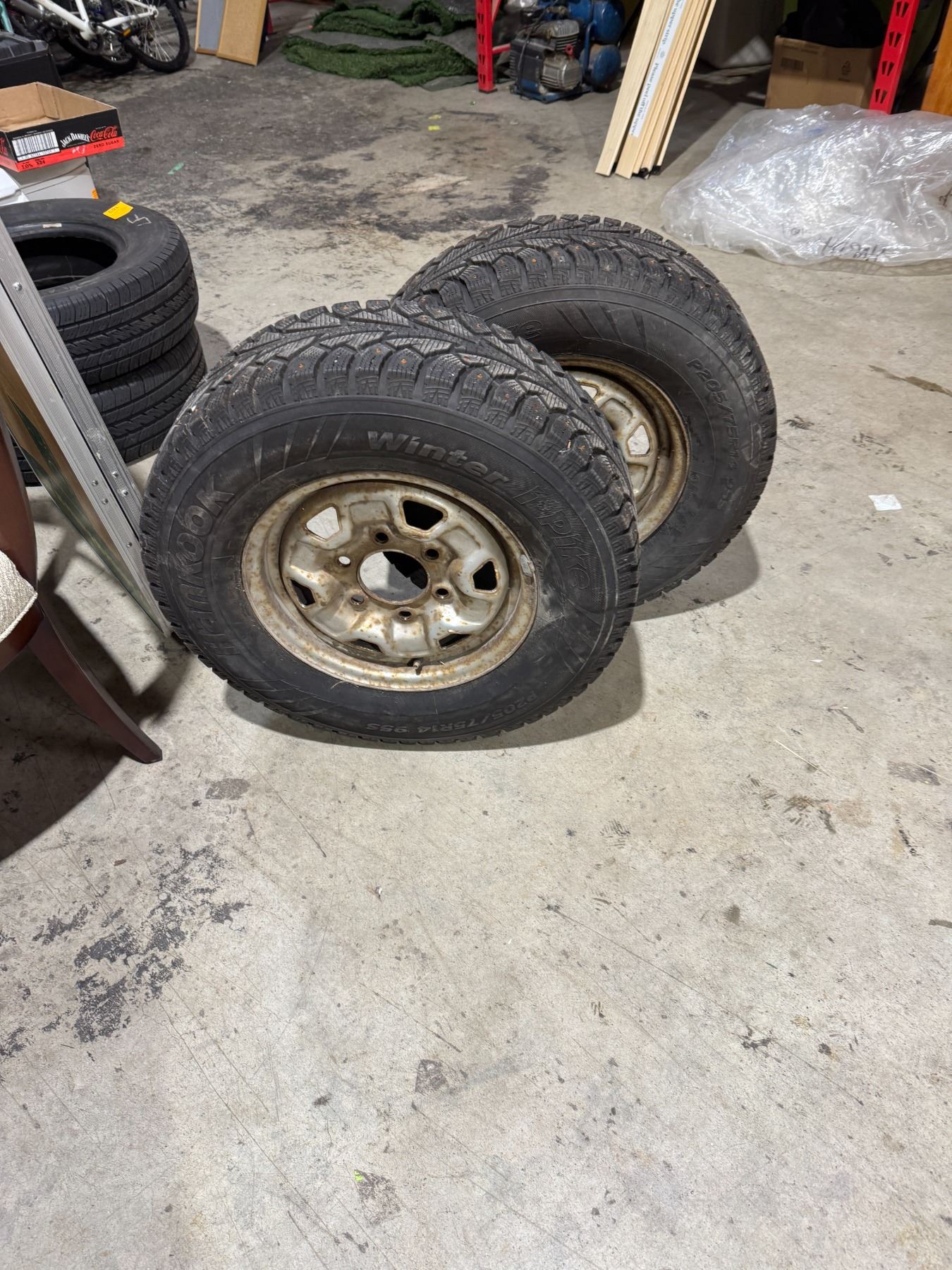 Winter studded tires on rims P205/75R 14 95S