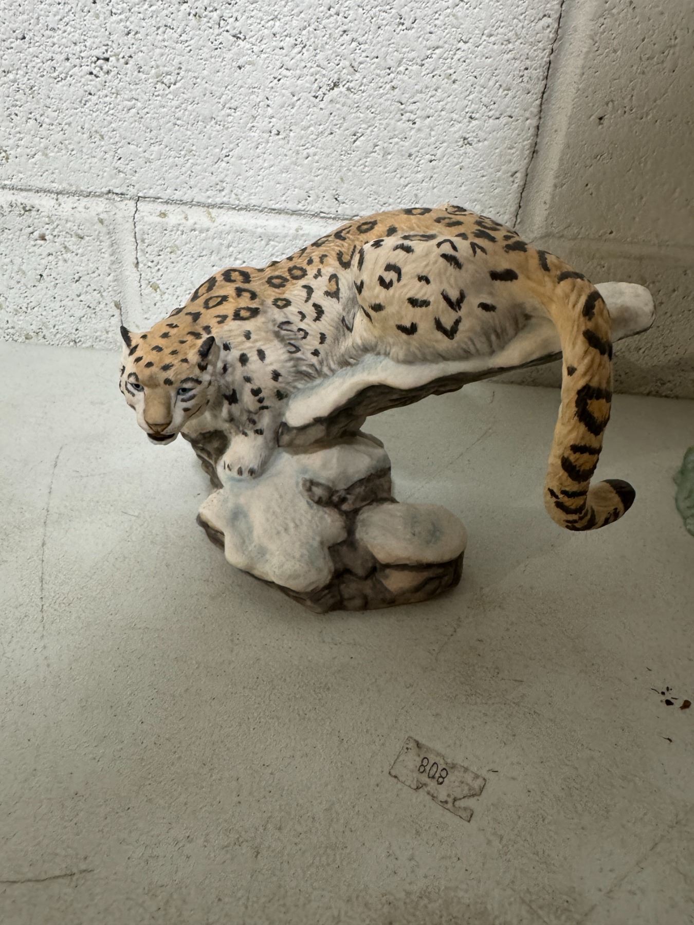 Porcelain great cats of the world snow leopard