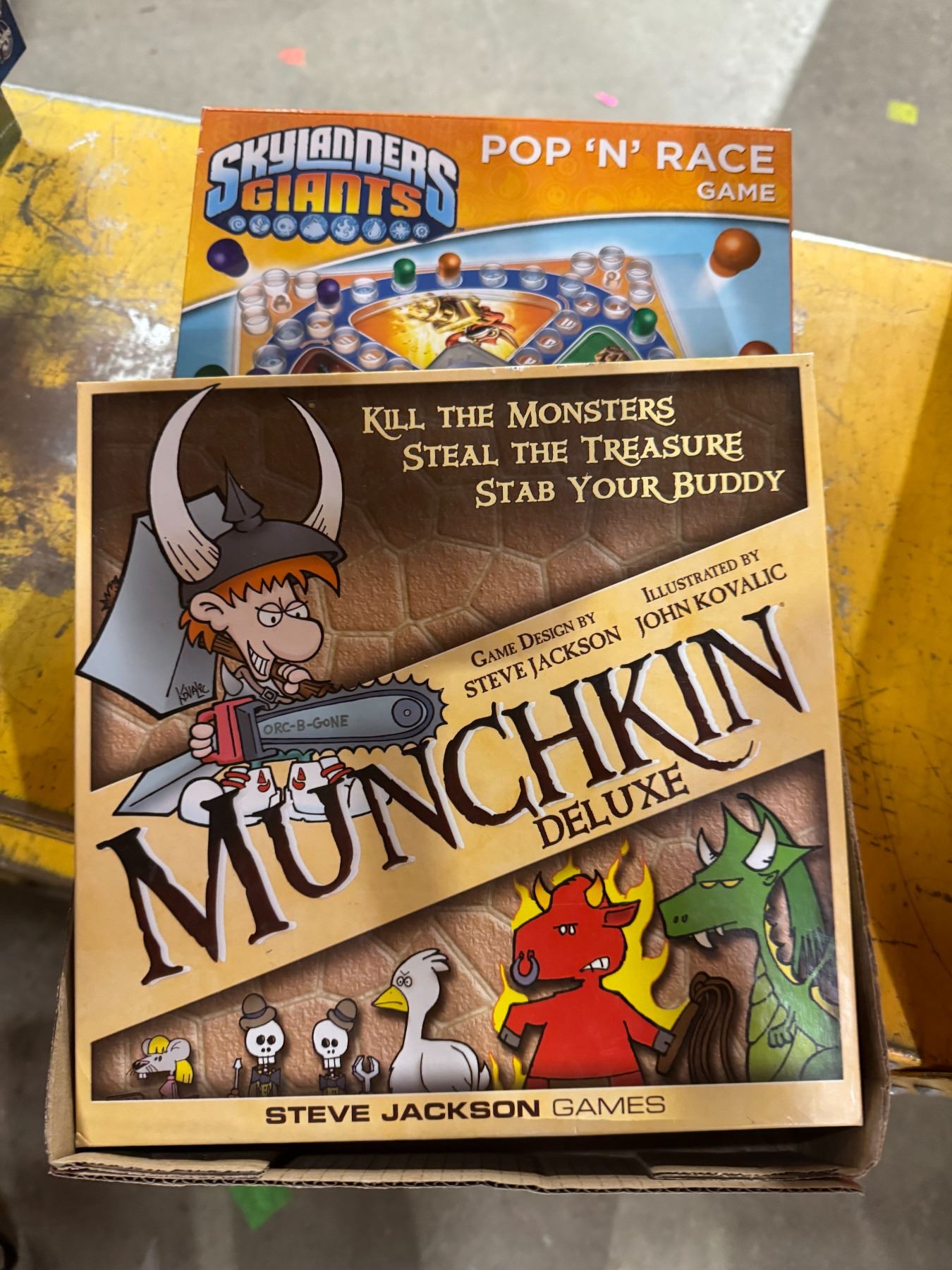 Munchkin deluxe and Skylanders pop and race game