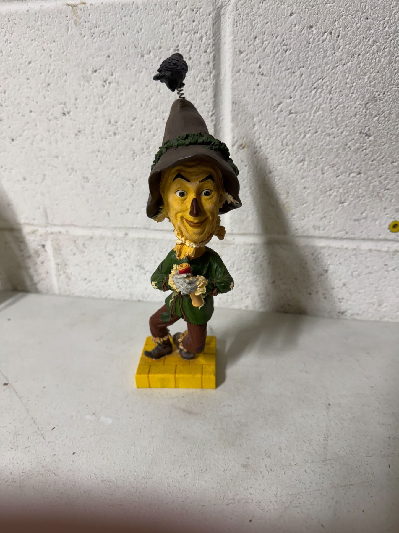 The Wizard of Oz scarecrow bobble head some damage see picture