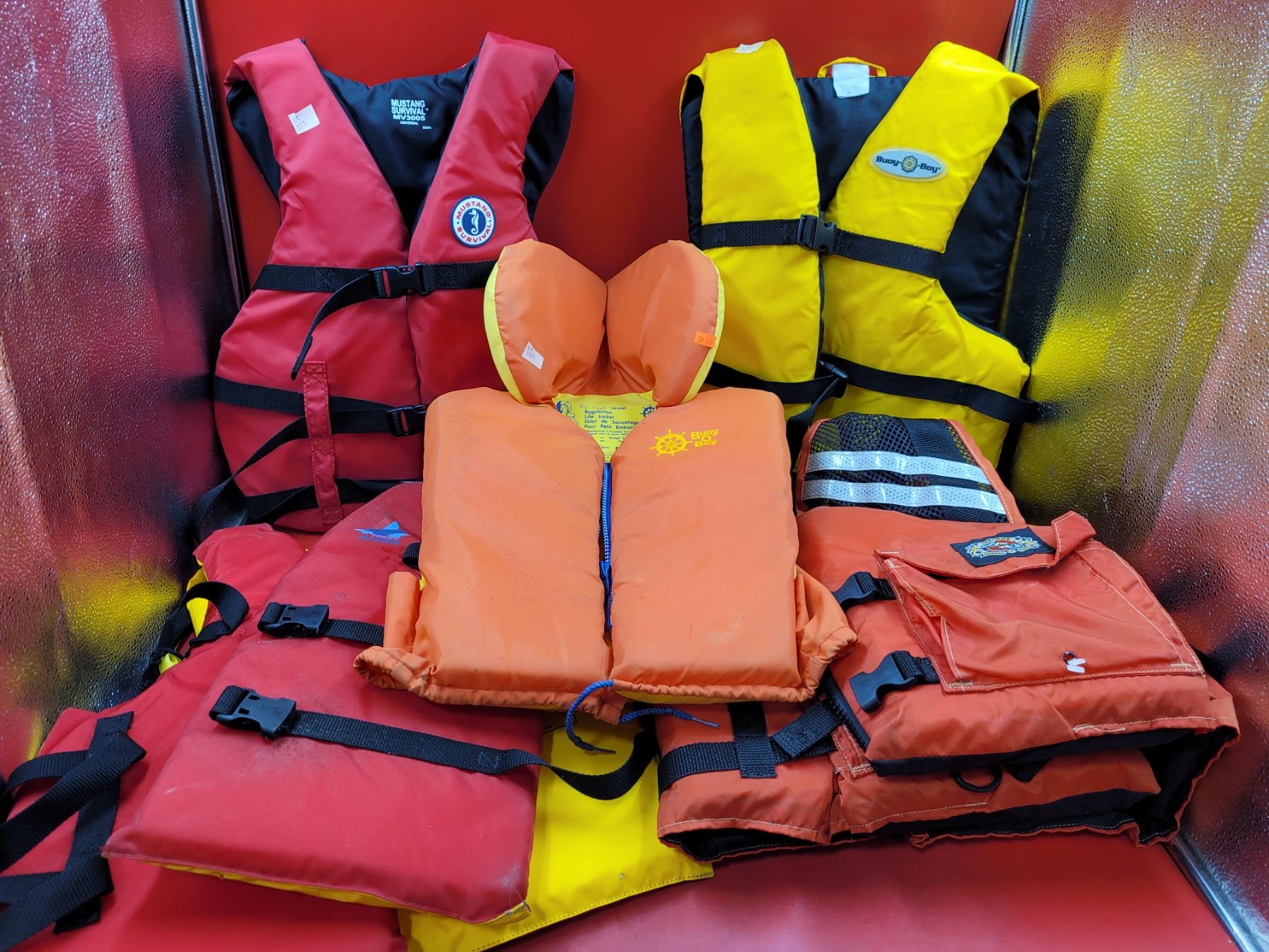 Life Jacket Lot (Buoy O Boy, Stearns, Mustang Survival, & Trekk Marine)