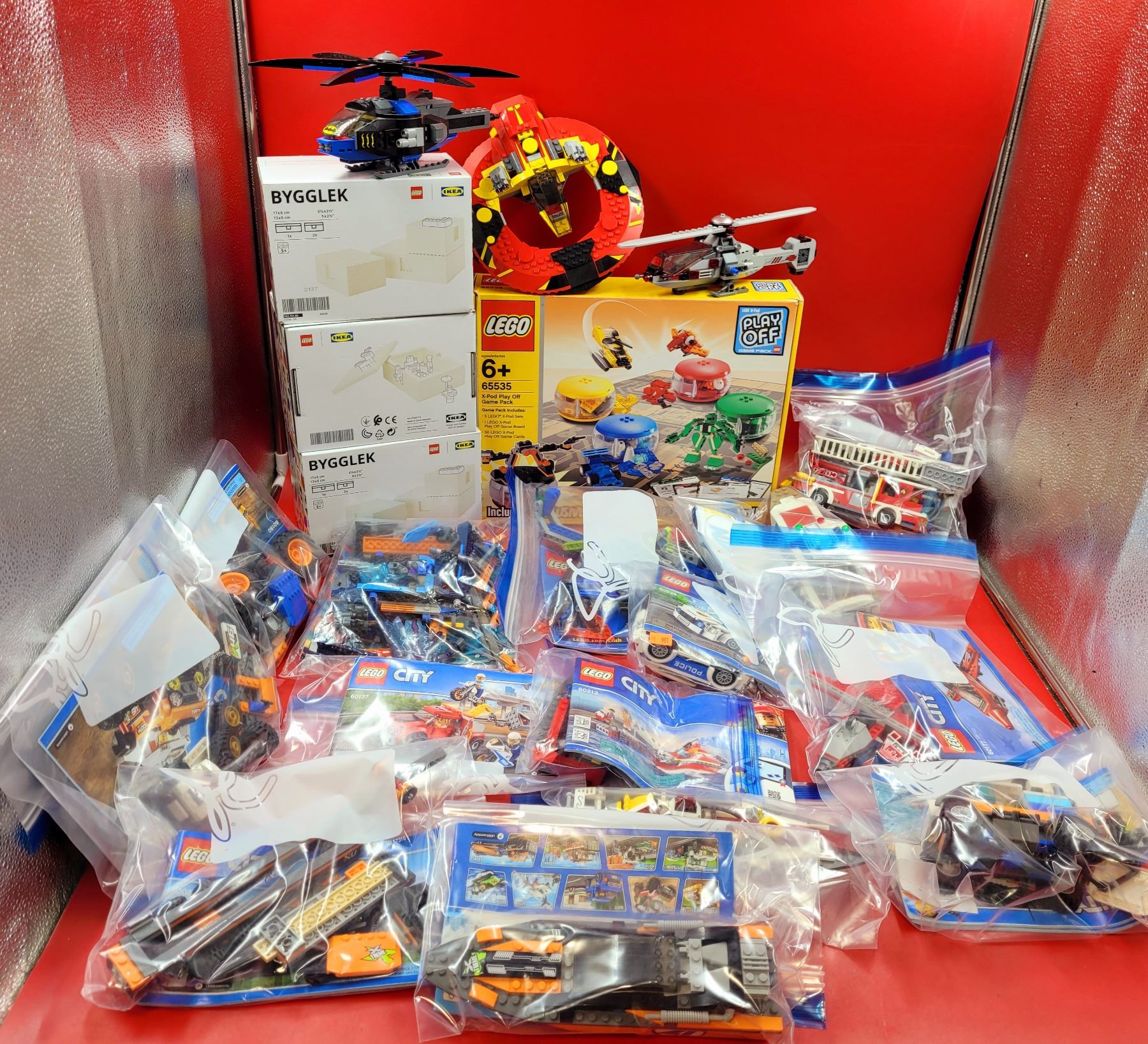 Assorted Lego Vehicles, IKEA x Lego Boxes, & Lego X-Pod Playoff Game Pack