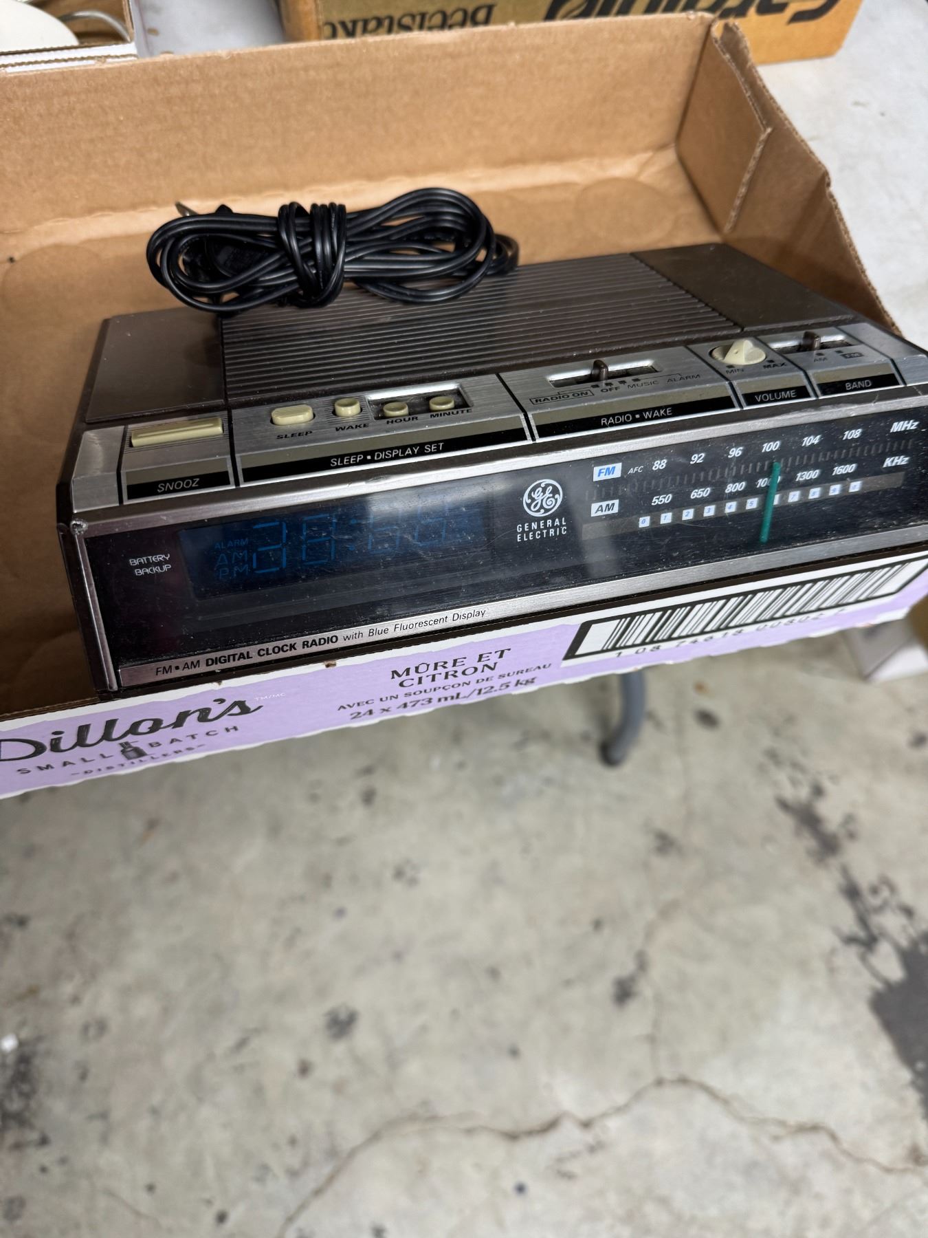 Vintage GE digital clock radio with blue fluorescent display