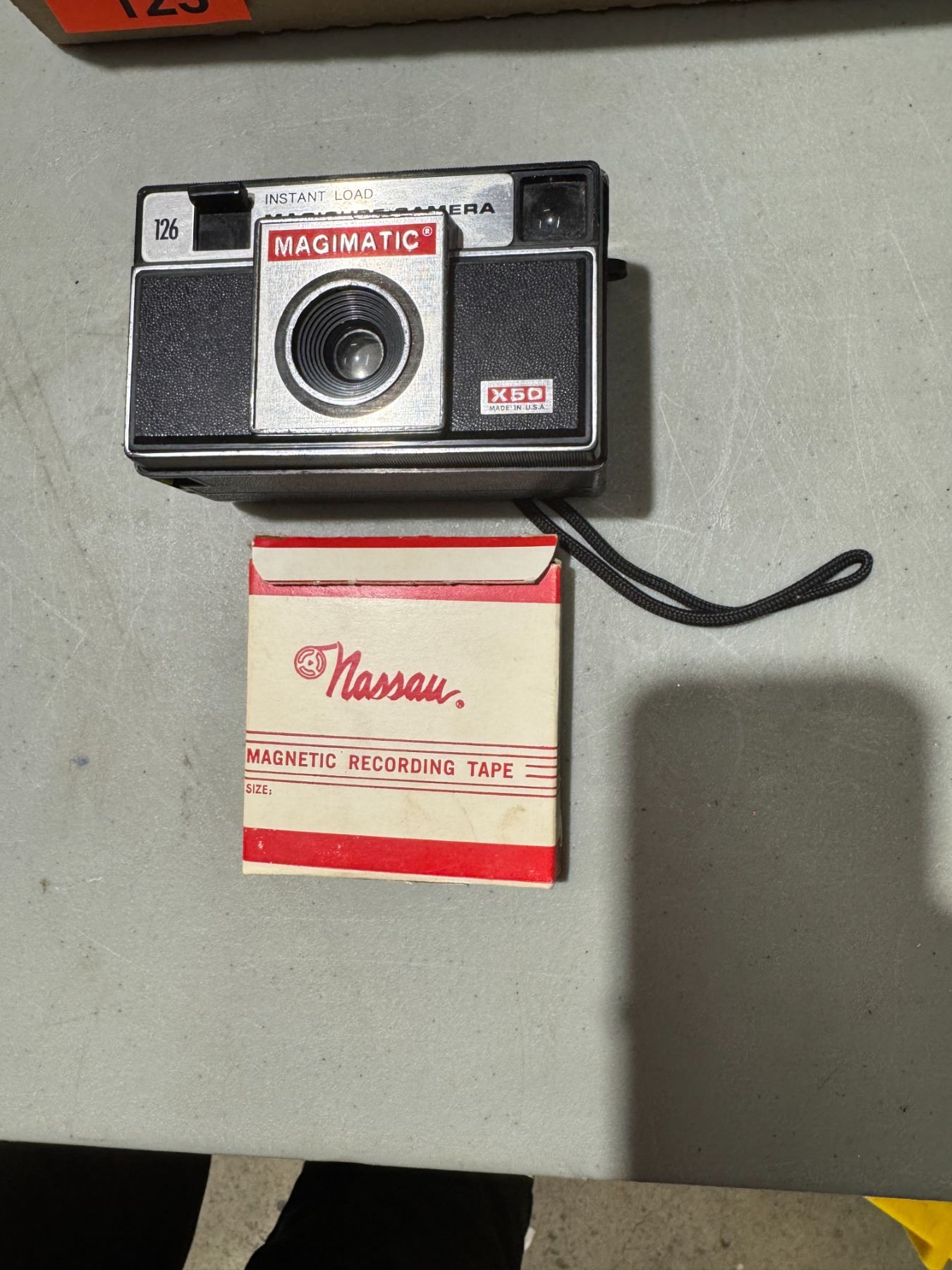 Magic cube camera Magimatic x50 and magnetic recording tape