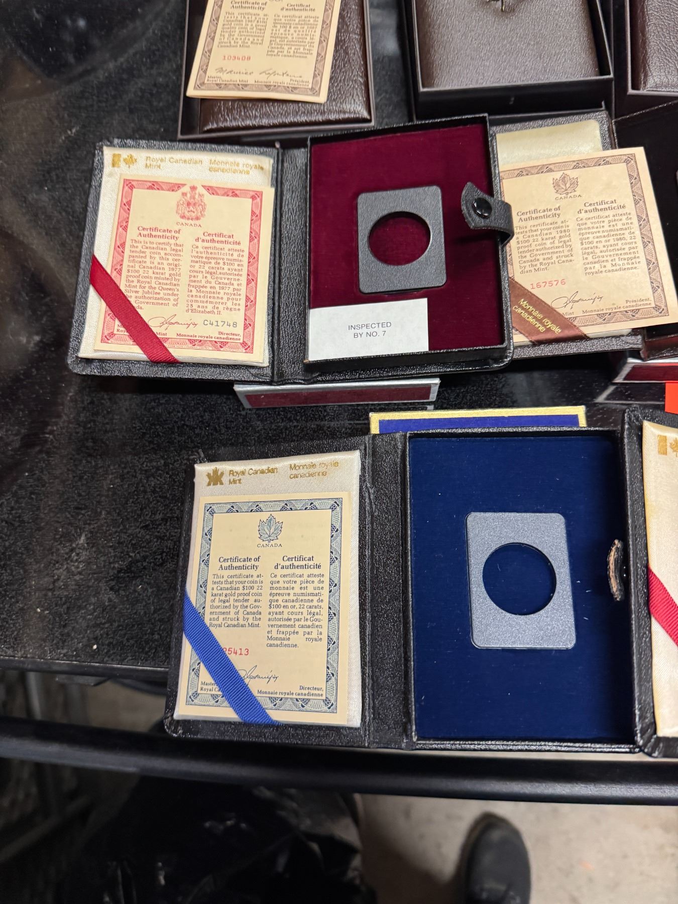RCM empty gold coin cases some with COA
