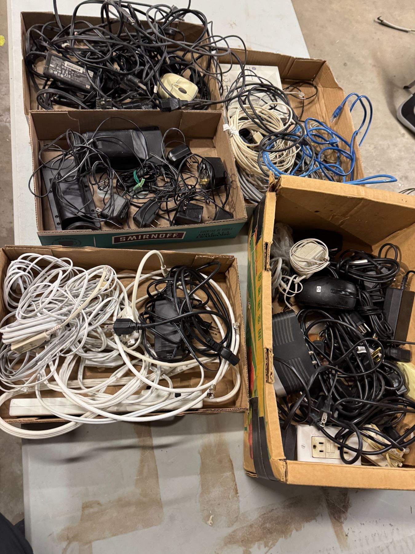 Assorted chords, power bars, answering machine, cables, etc.