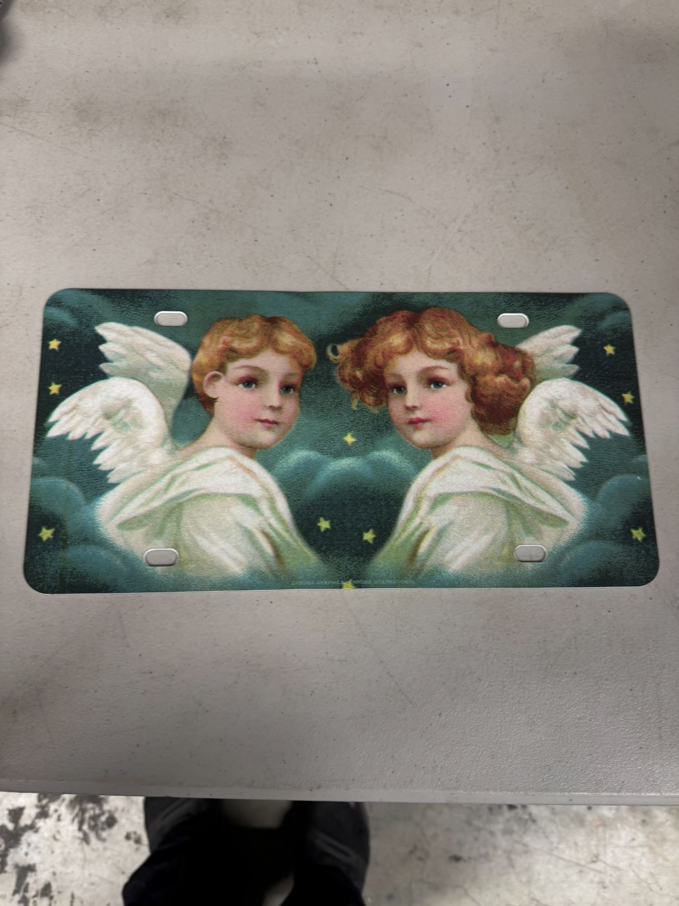 Vehicle plate, Angel