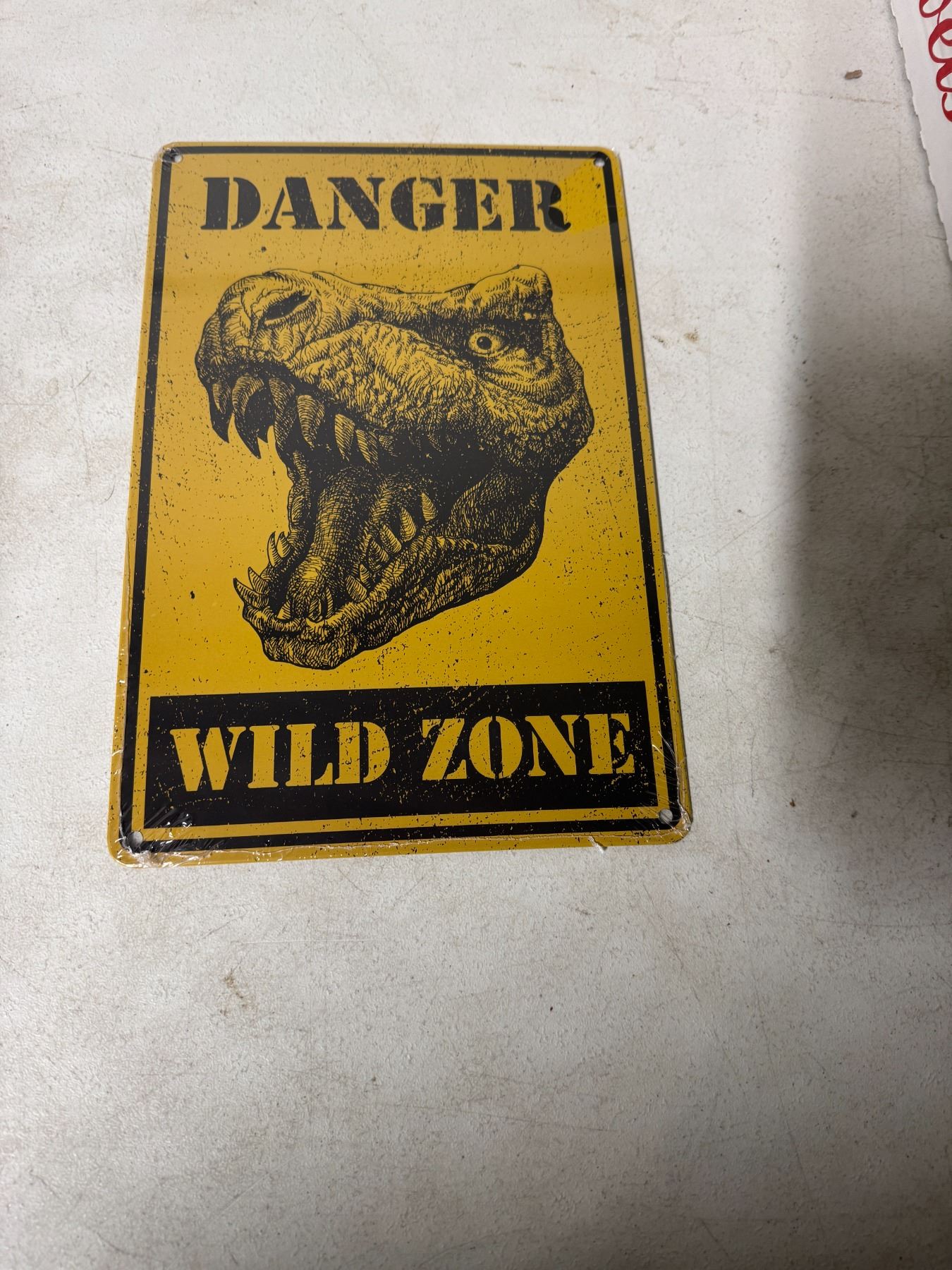 Danger, wild zone tin sign