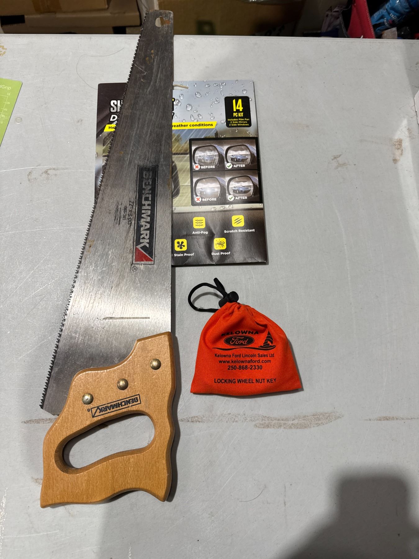 Saw locking wheel nut key and mirror item