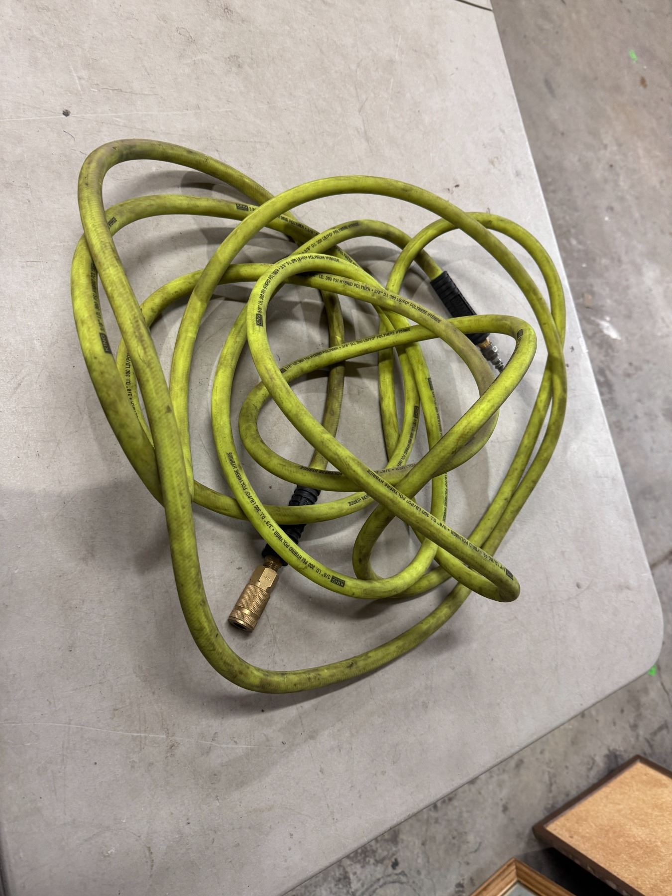Hybird polymer three-quarter inch D. I. 300 pound hose.