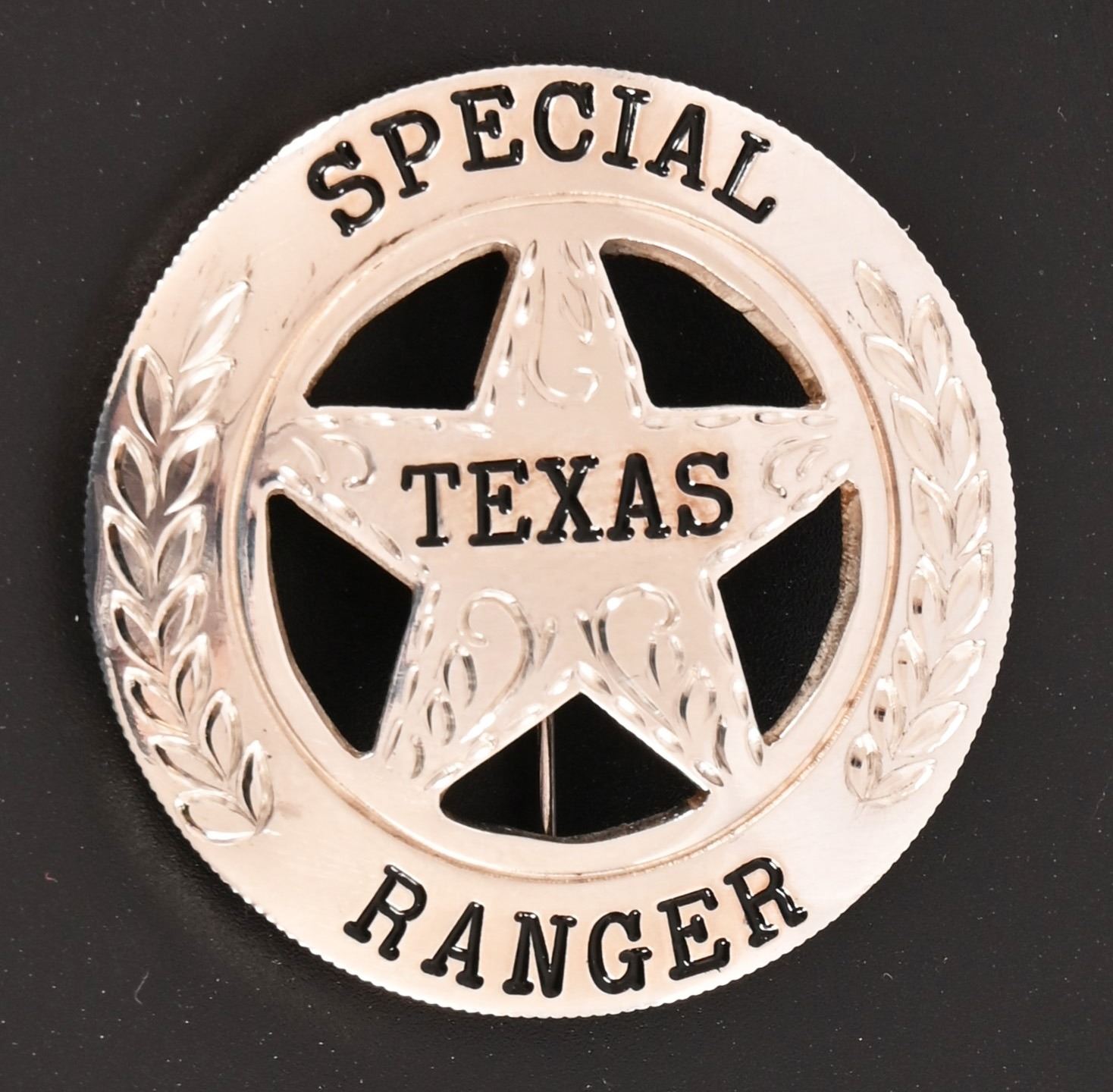Butch Thompson's Texas Ranger Cinco Peso Badge
