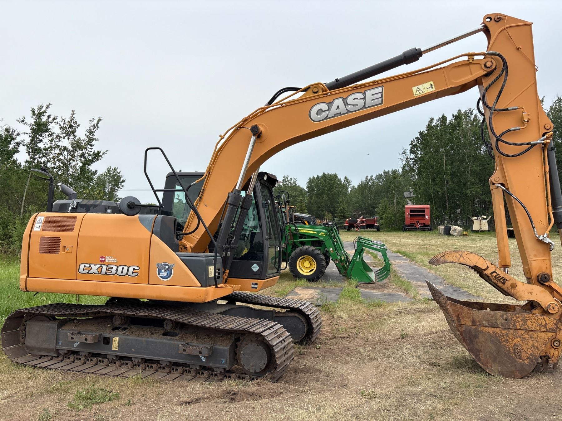 RK GROUP LOT 2015 Case LX130C Trackhoe, 1677 hrs c/w 34" WVM Bucket ...