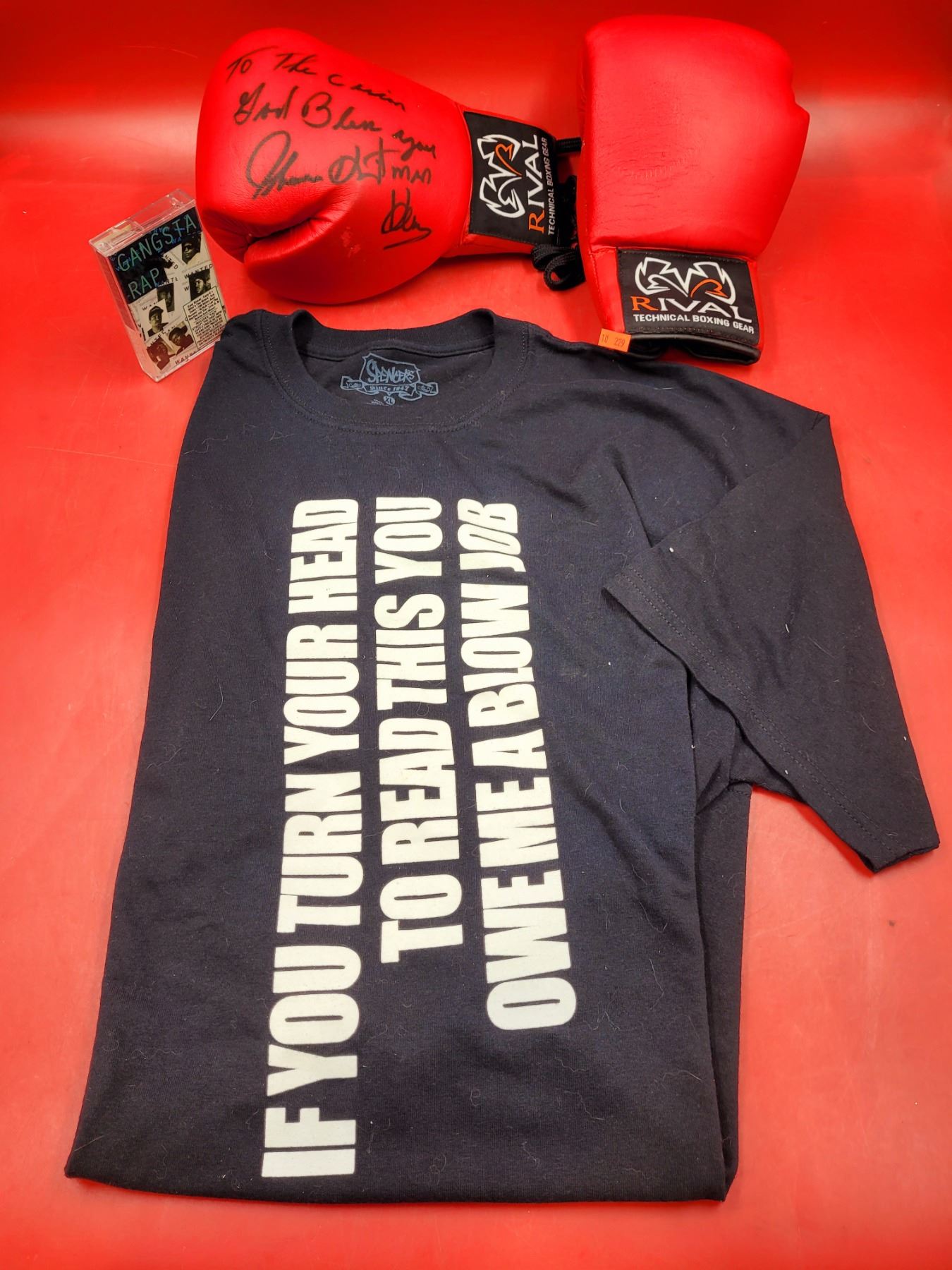 Signed Boxing Gloves, Erotic T-Shirt, & Gangsta Rap Cassette