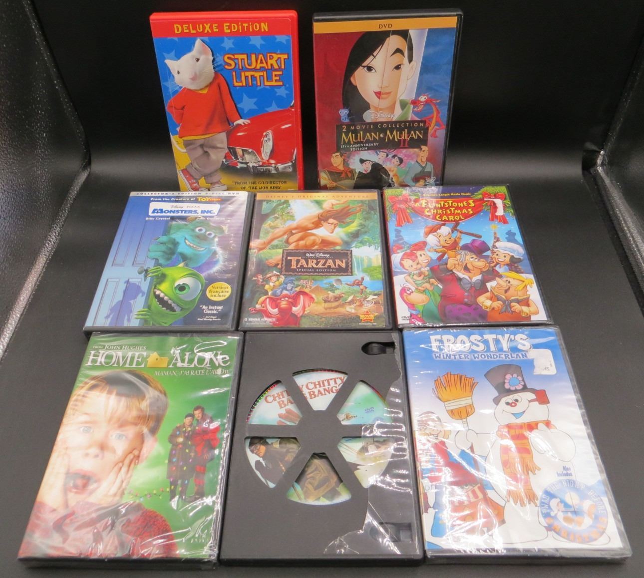 8 DVD Movies Stuart Little, Monster's Inc, Tarzan, Home Alone (All are ...