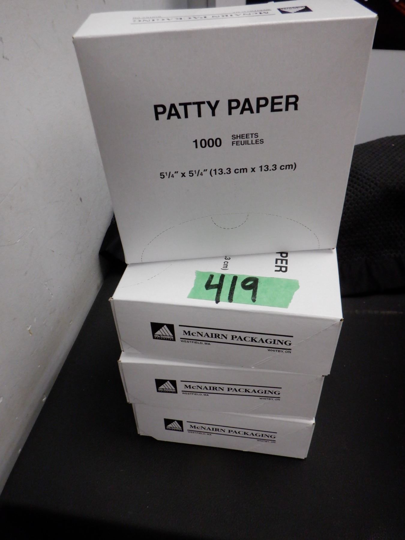 4 boxes of hamburger patty papers with 1000 sheets in each box