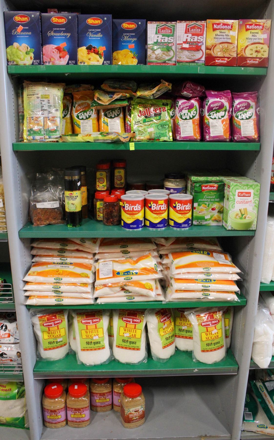 LARGE LOT OF ASSORTED POWDERS, FINE SUGAR, TANG
