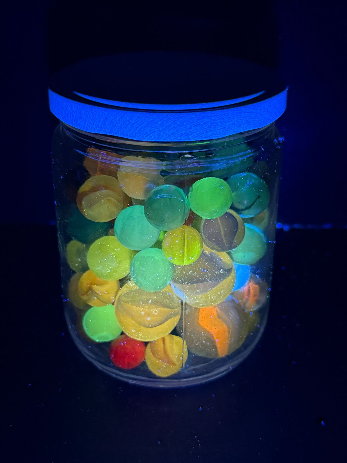 Jar of Vintage UV Reactive Glass Marbles