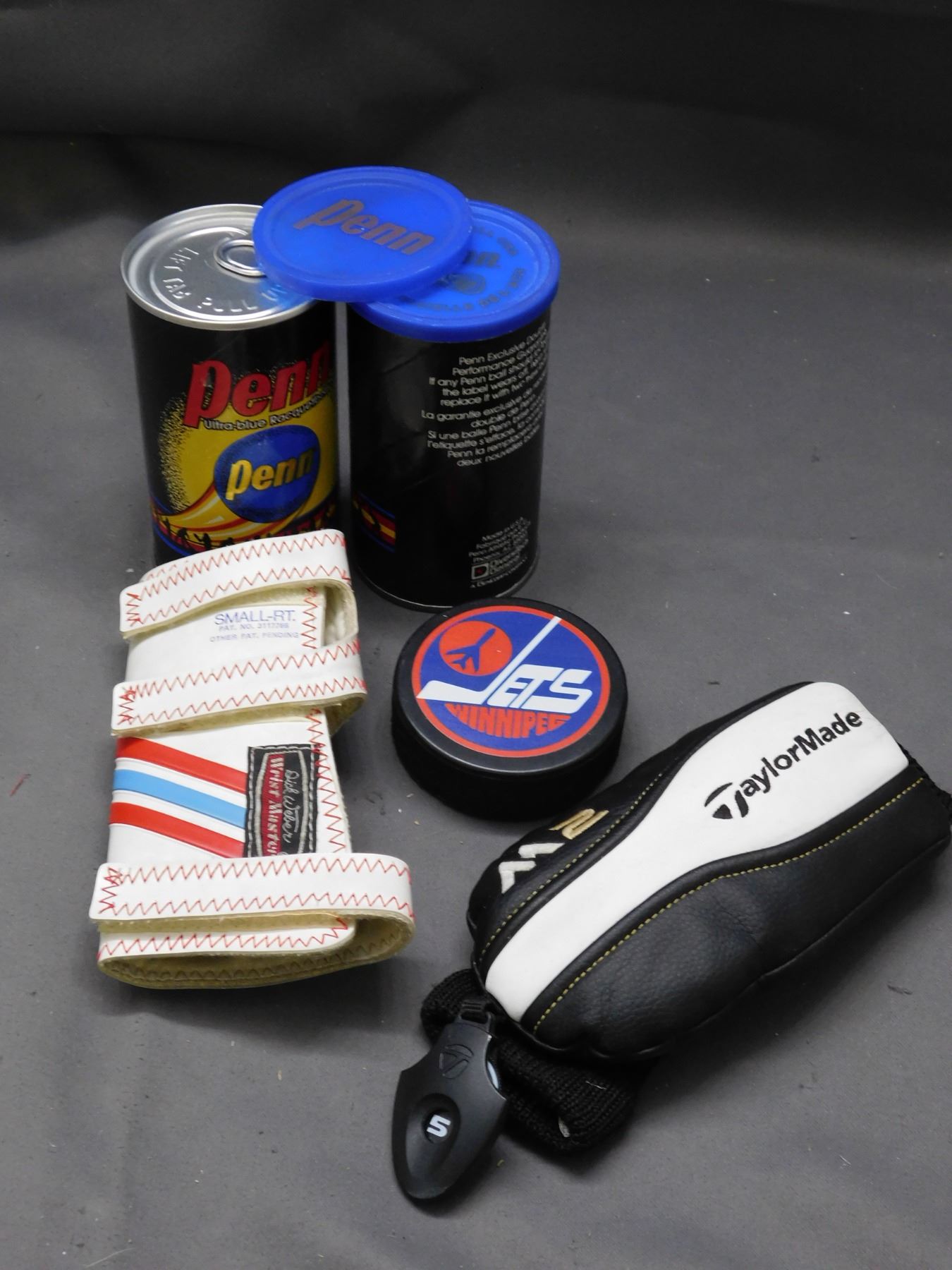 Lot of Penn Exclusive Racquetballs, Golf Sock, Jets Hockey Puck, etc