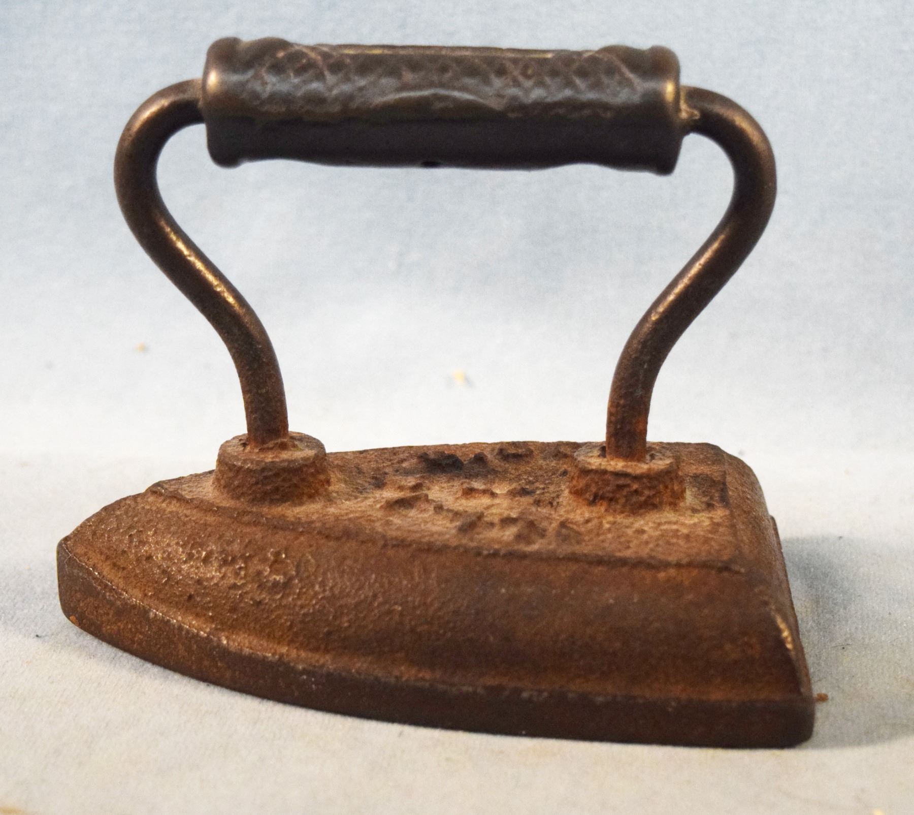 Vintage cast iron clothes iron, 5.5" & Large brass platter, 19"