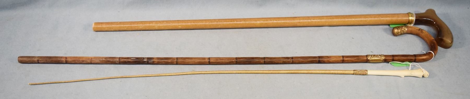 3 pcs: wooden cane w/ poly handle, 32.5" long; wooden case with brass ...