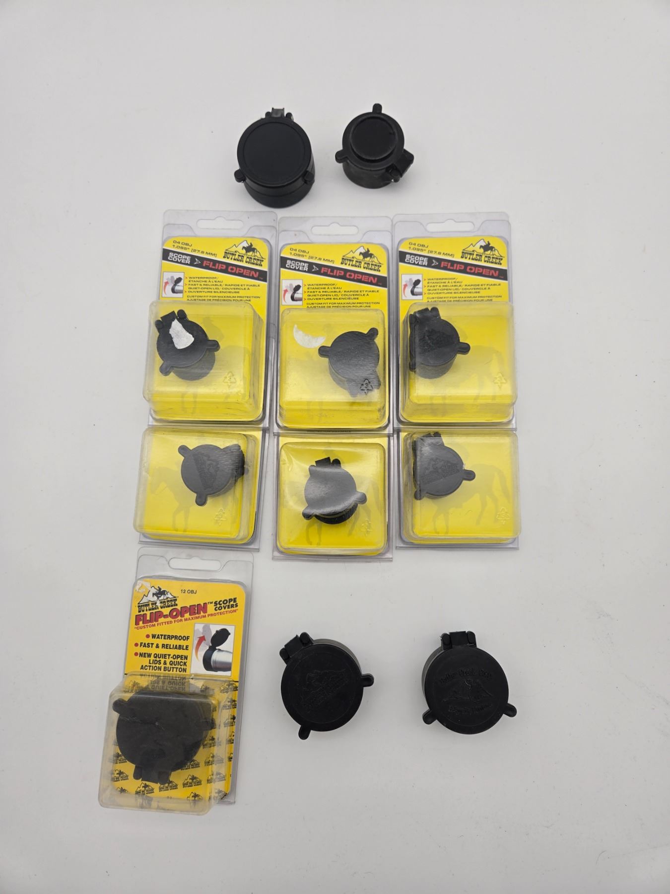 Flip open scope covers