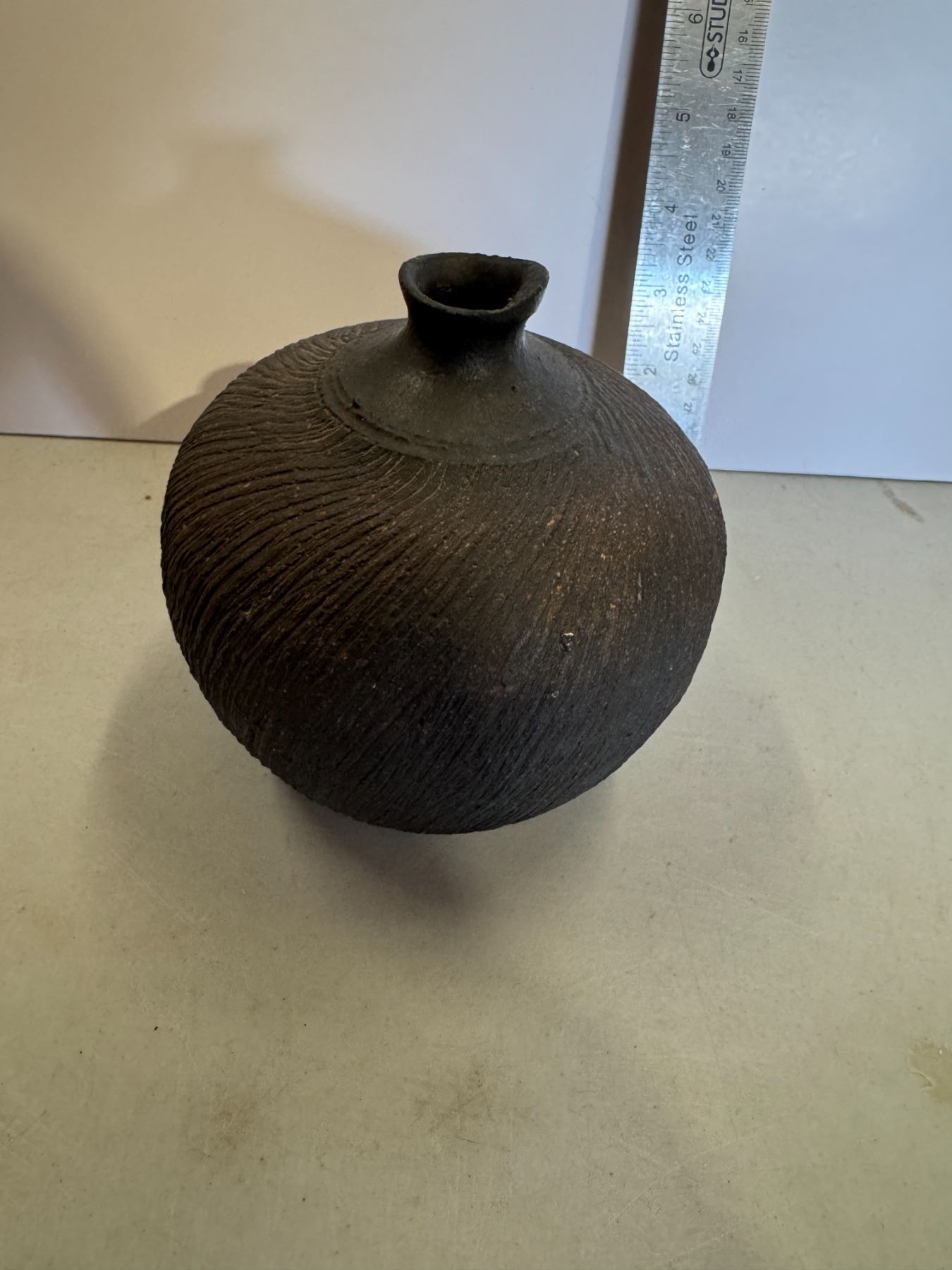 Signed pottery vase