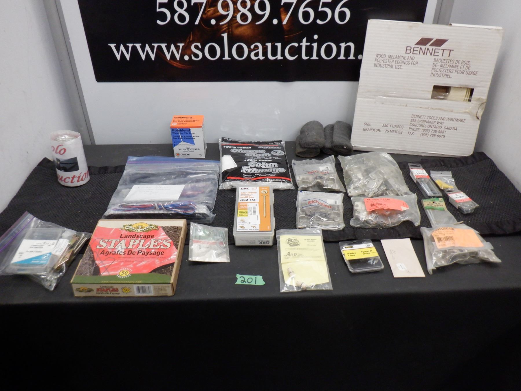 Large lot of hardware items in packages, screws in various sizes ...