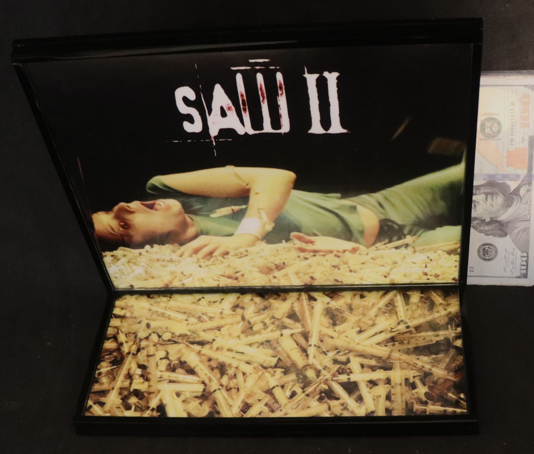 SAW II NEEDLE PIT TRAP SYRINGES ACRYLIC DISPLAY