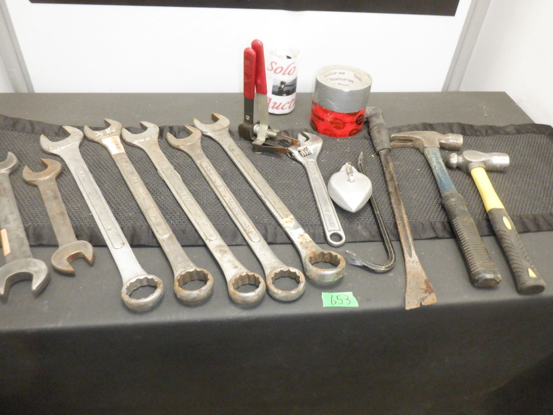 Lot of tools including combination wrenches, wrench, 2 pry bars, ball ...