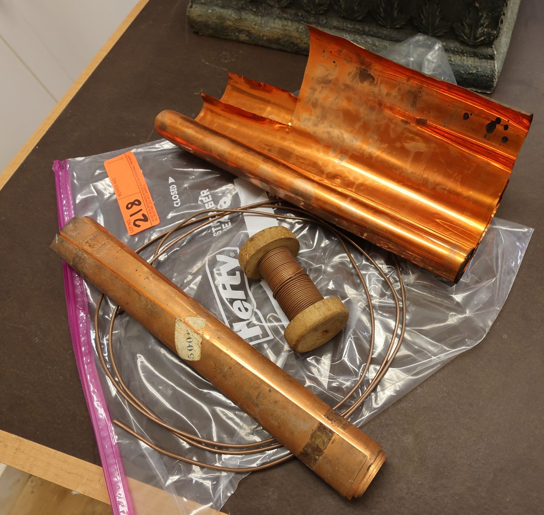 Multiple Rolls Copper Colored Sheeting & Spool Wire