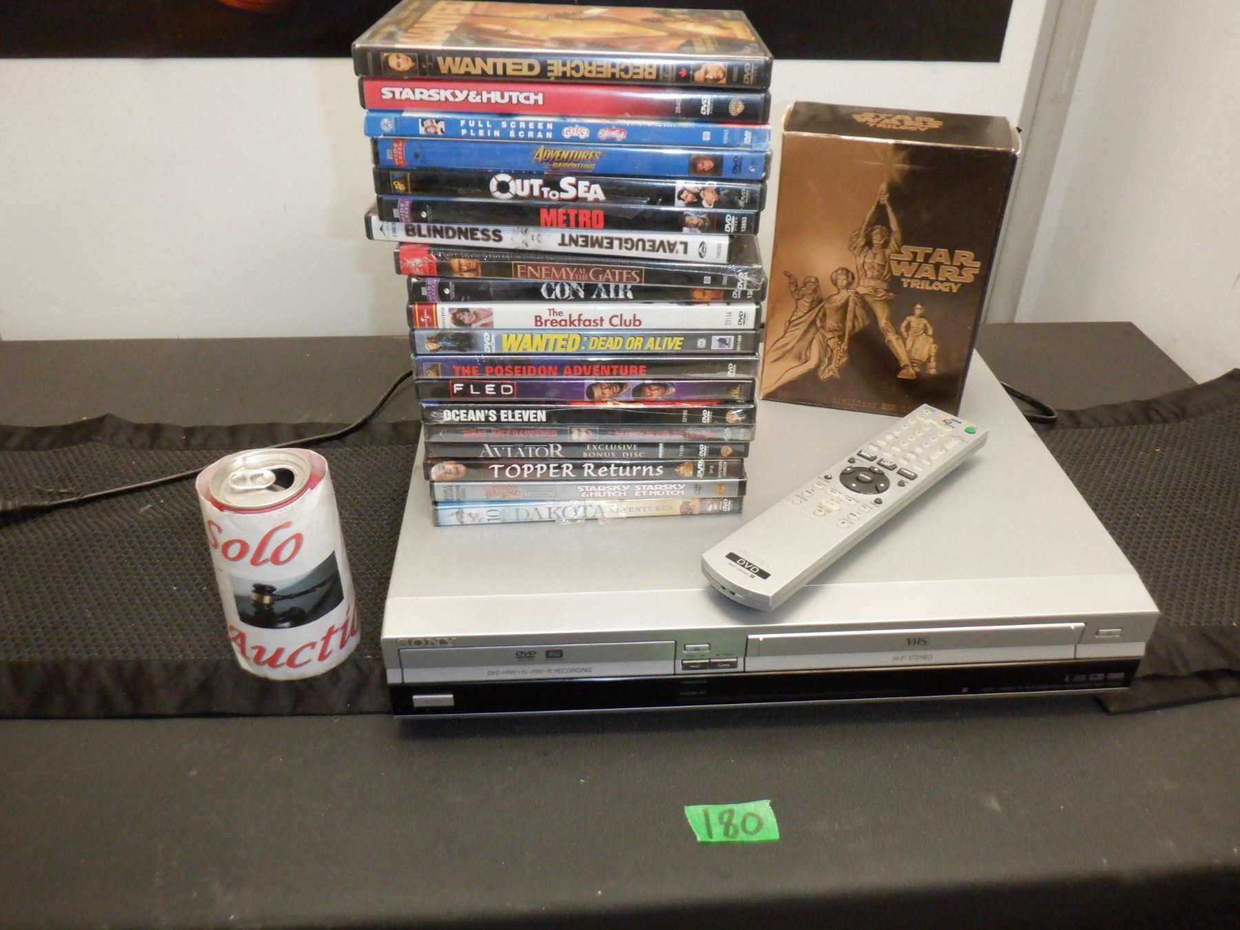 Sony DVD/VHS player with remote and 20 plus DVDs including Wanted ...