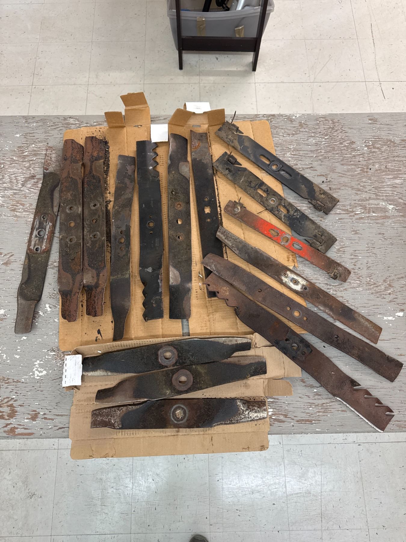 Large collection of lawn mower blades