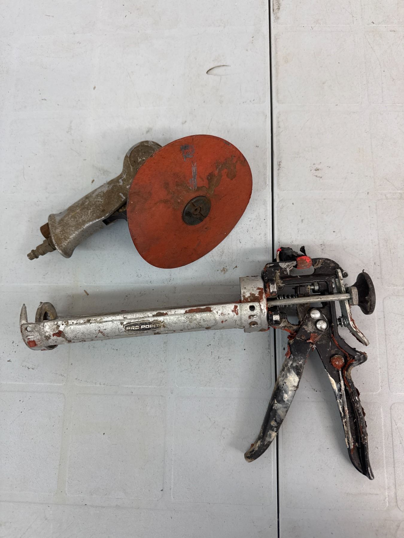 Air grinder and caulking gun