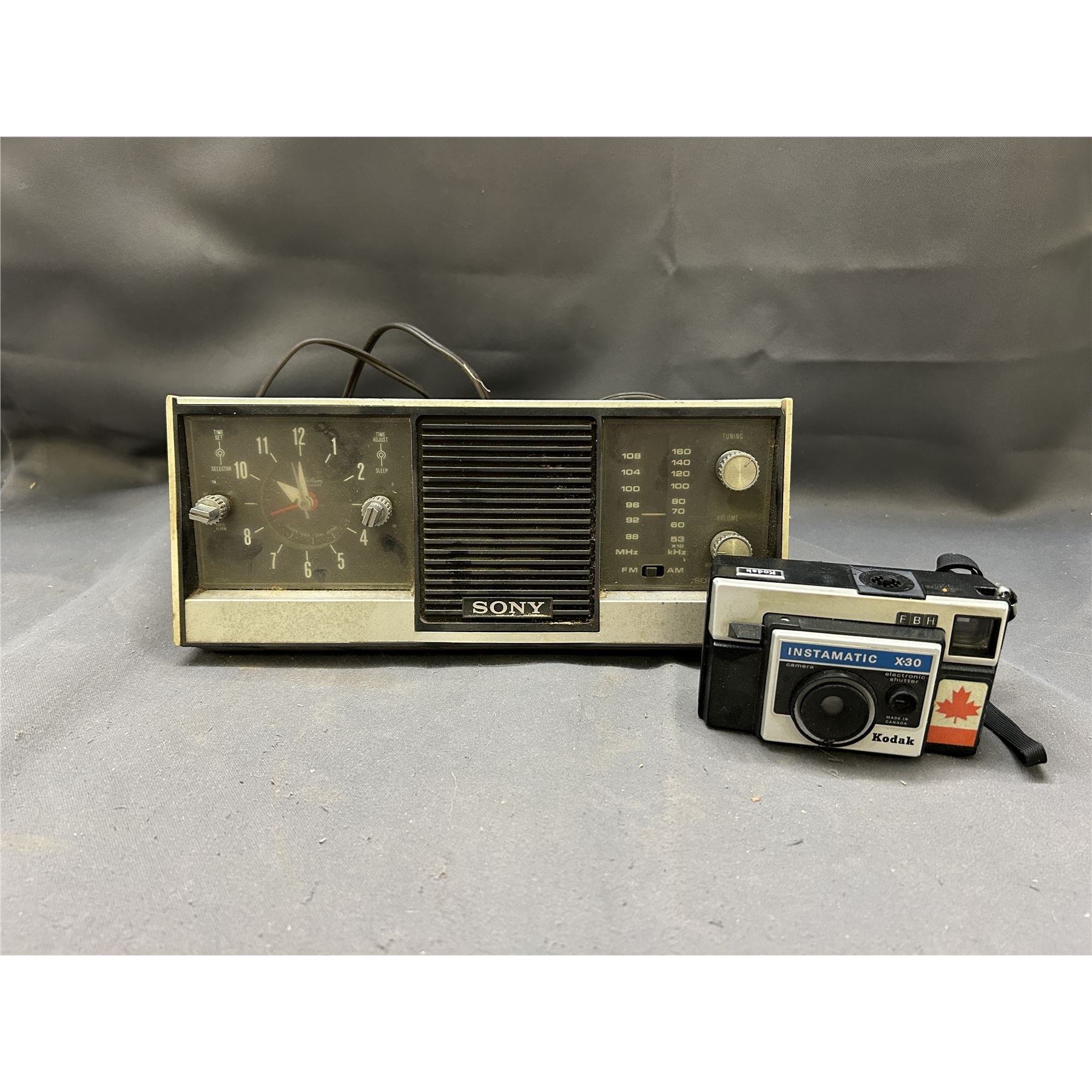 SONY AM FM Alarm Clock Radio and Kodak Instamatic X-30 Camera
