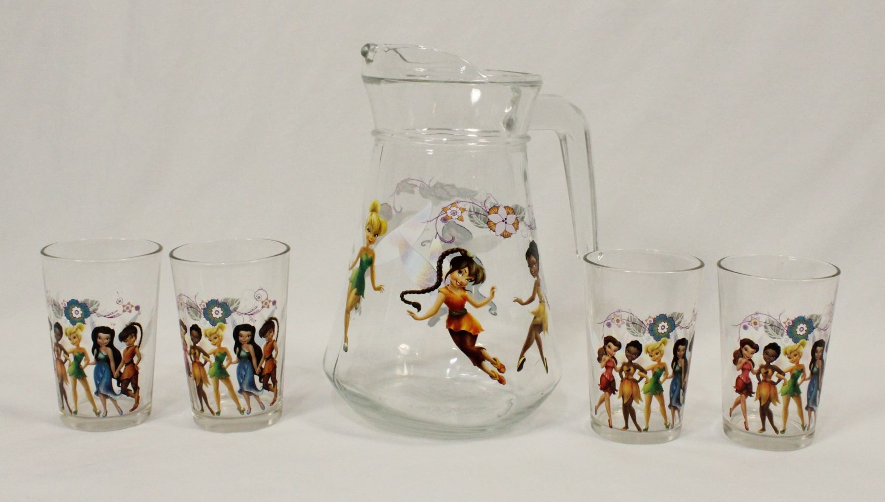 A Disney Fairies Pitcher and Glass set.