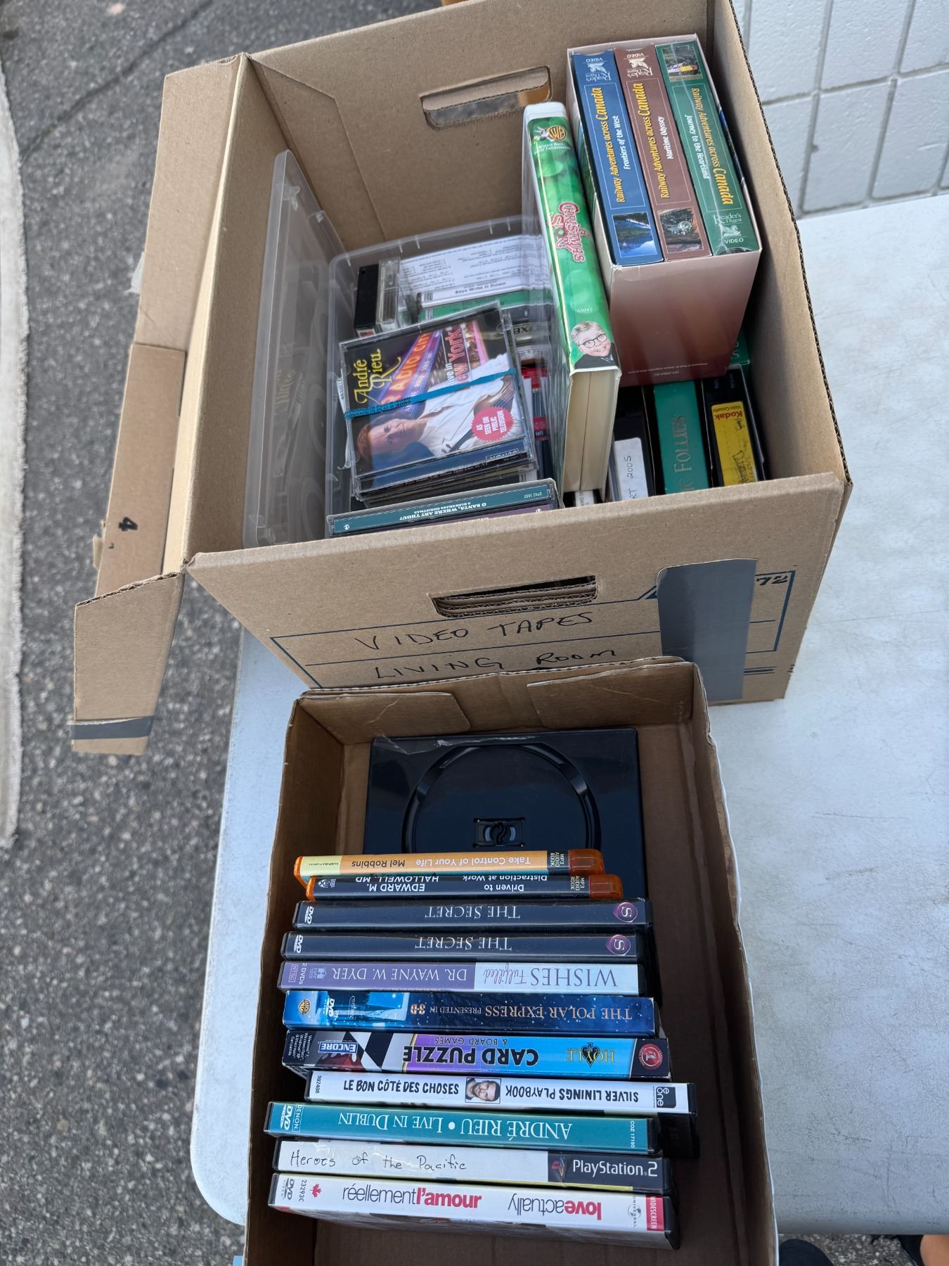 VHS CDs and DVDs