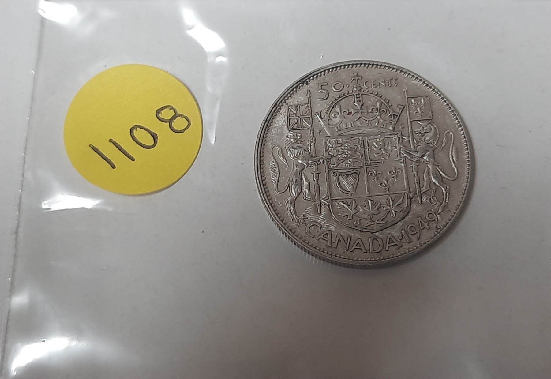 1949 hoof over 9 canadian silver 50 cents - Schmalz Auctions