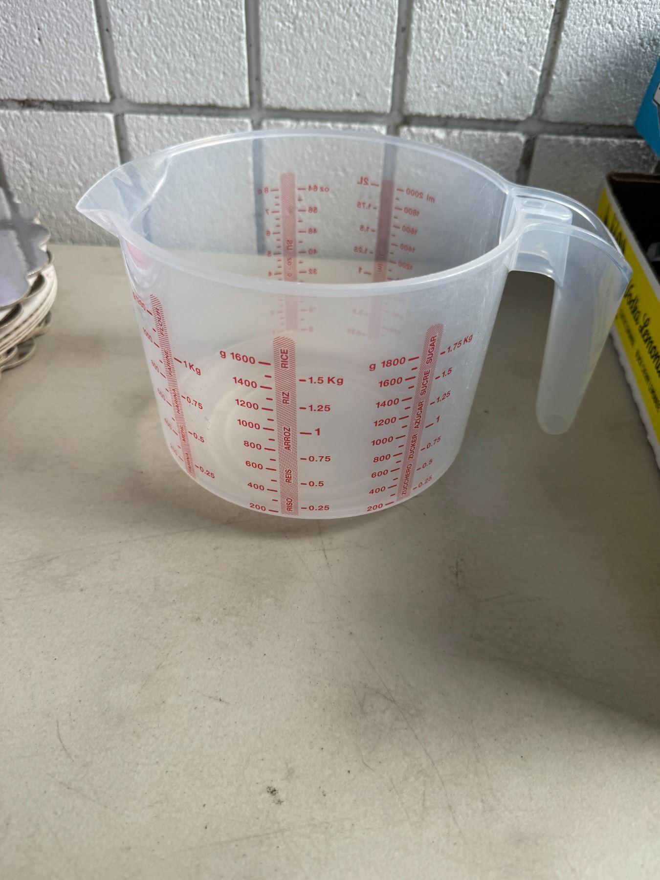 Tupperware measuring cup