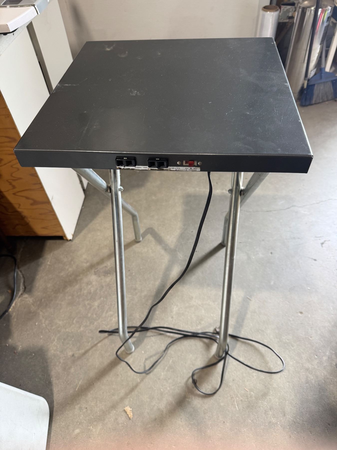 Folding power powered stand