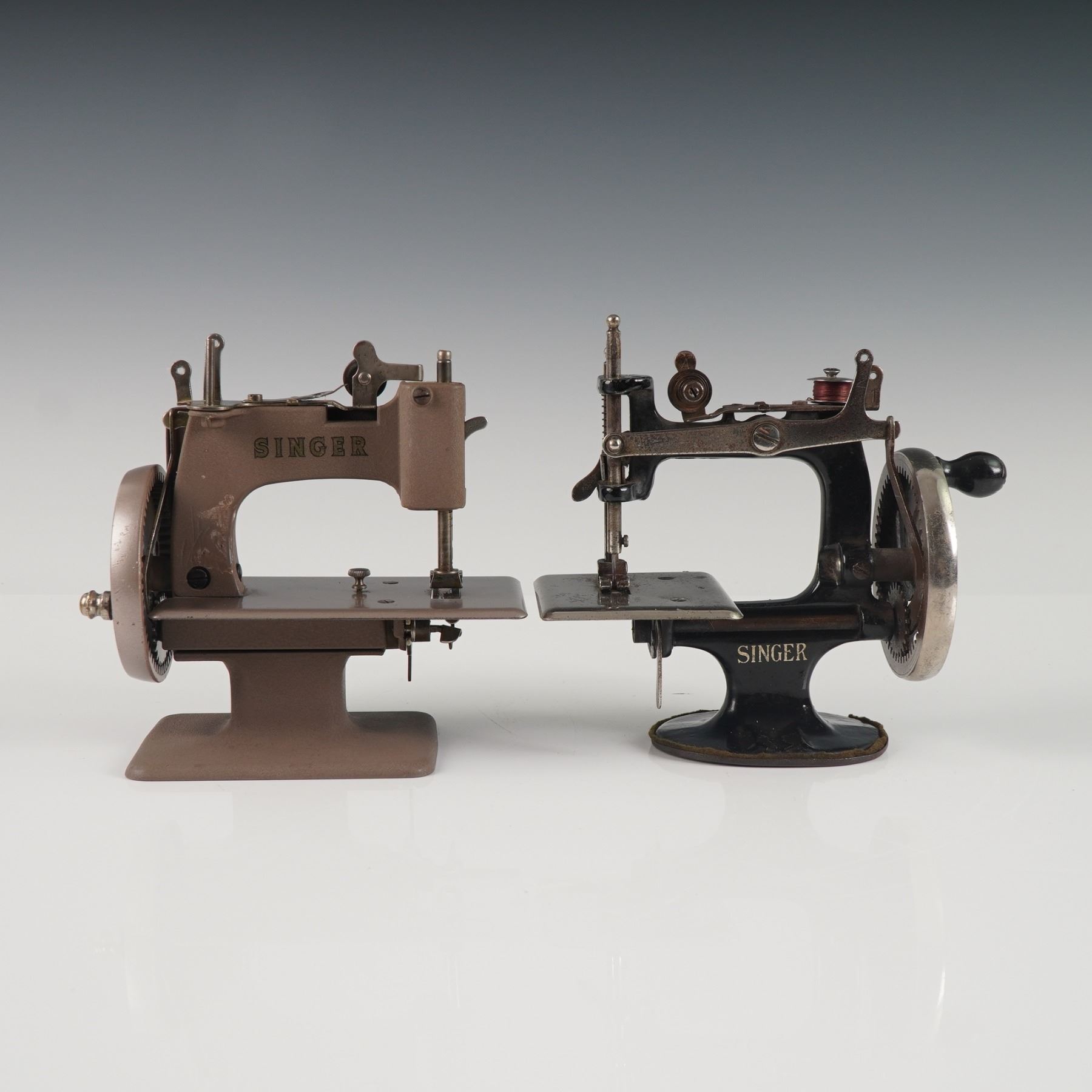 Pair of Antique Singer Cast Iron Toy Sewing Machines