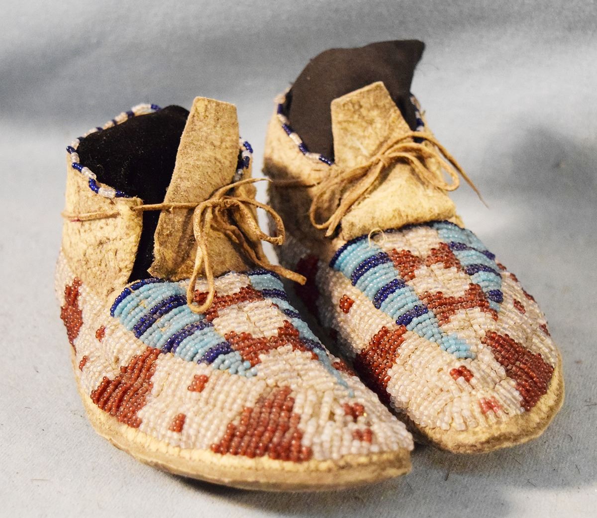 (2) Pair of beaded Northern Plains Indian moccasins, 7" long & 8" long