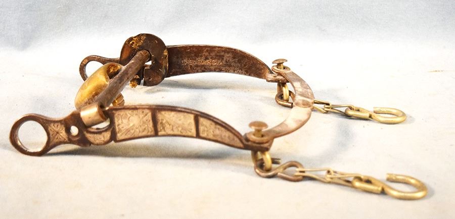 G.S. Garcia silver mounted spade bit, swivel cheek with roller and rein ...