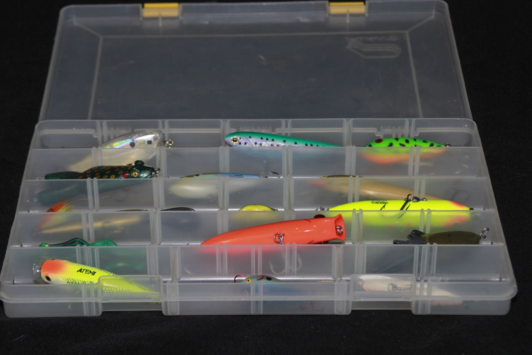 Plano tackle box with 15 various lures: Heddon, Atemi, Excalibur, etc.