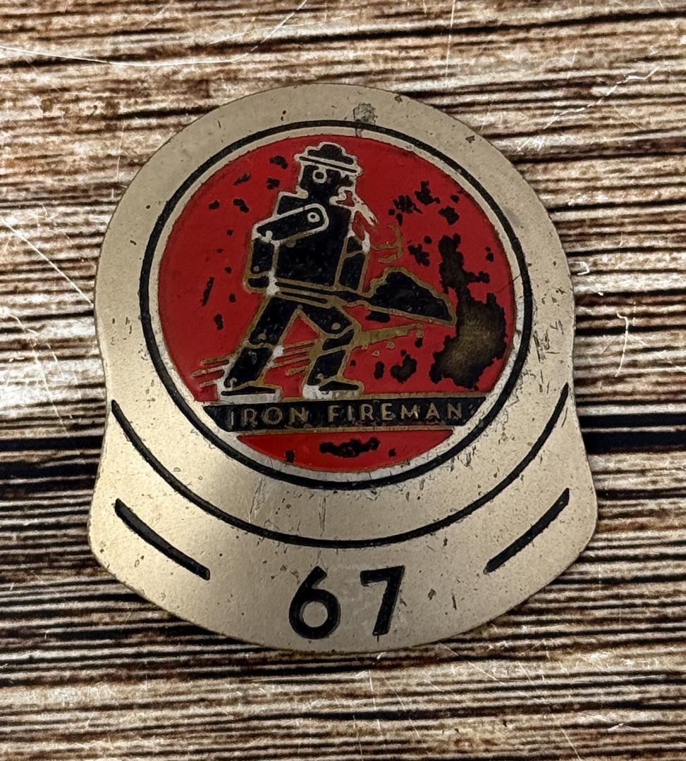 The Iron Fireman Coal Furnace Service Badge