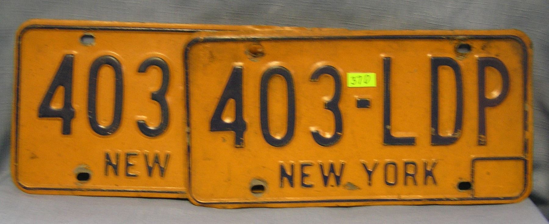Pair of vintage NY license plates