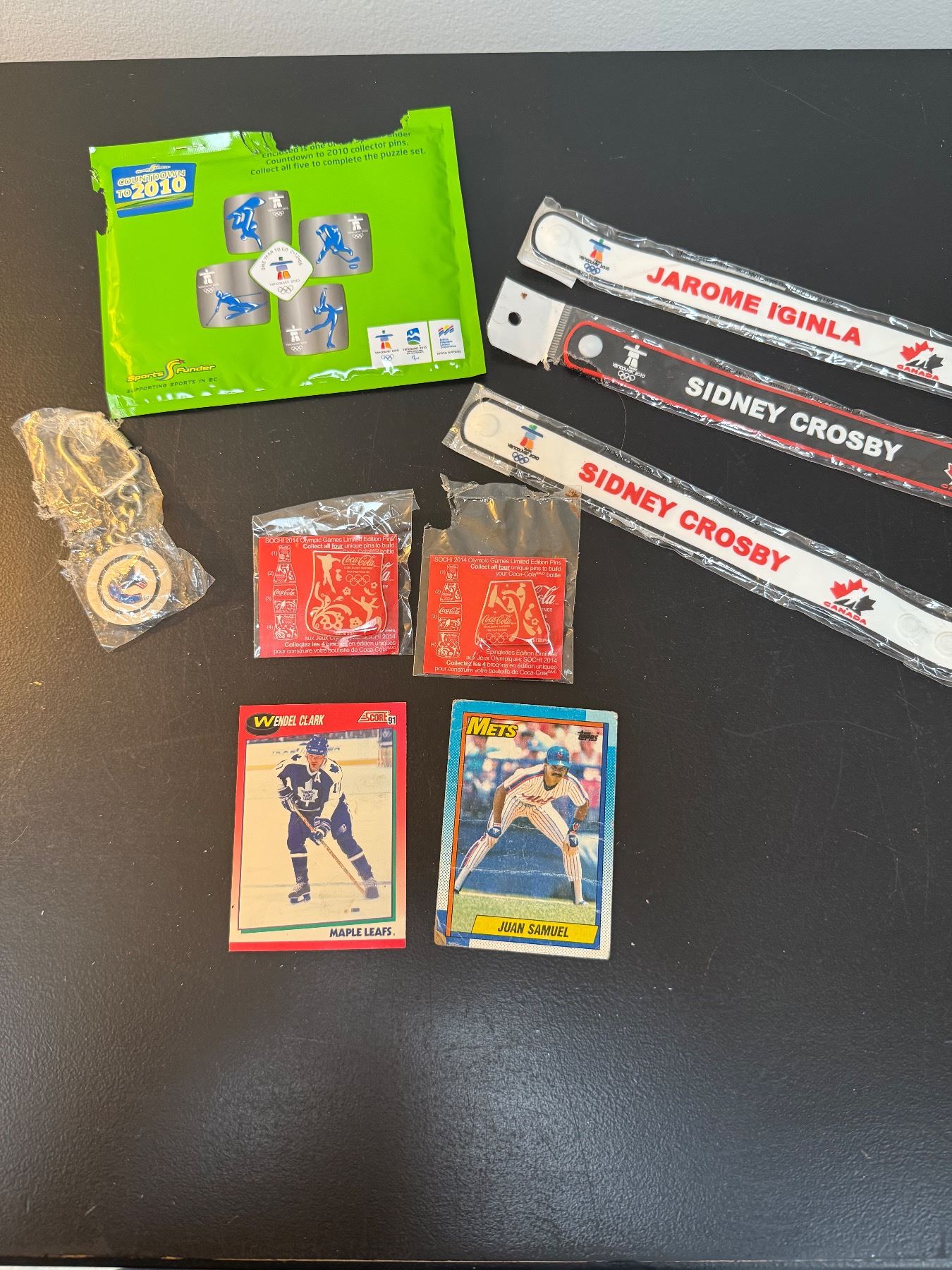 Assorted sports lot 2010 Olympics baseball card hockey card pins