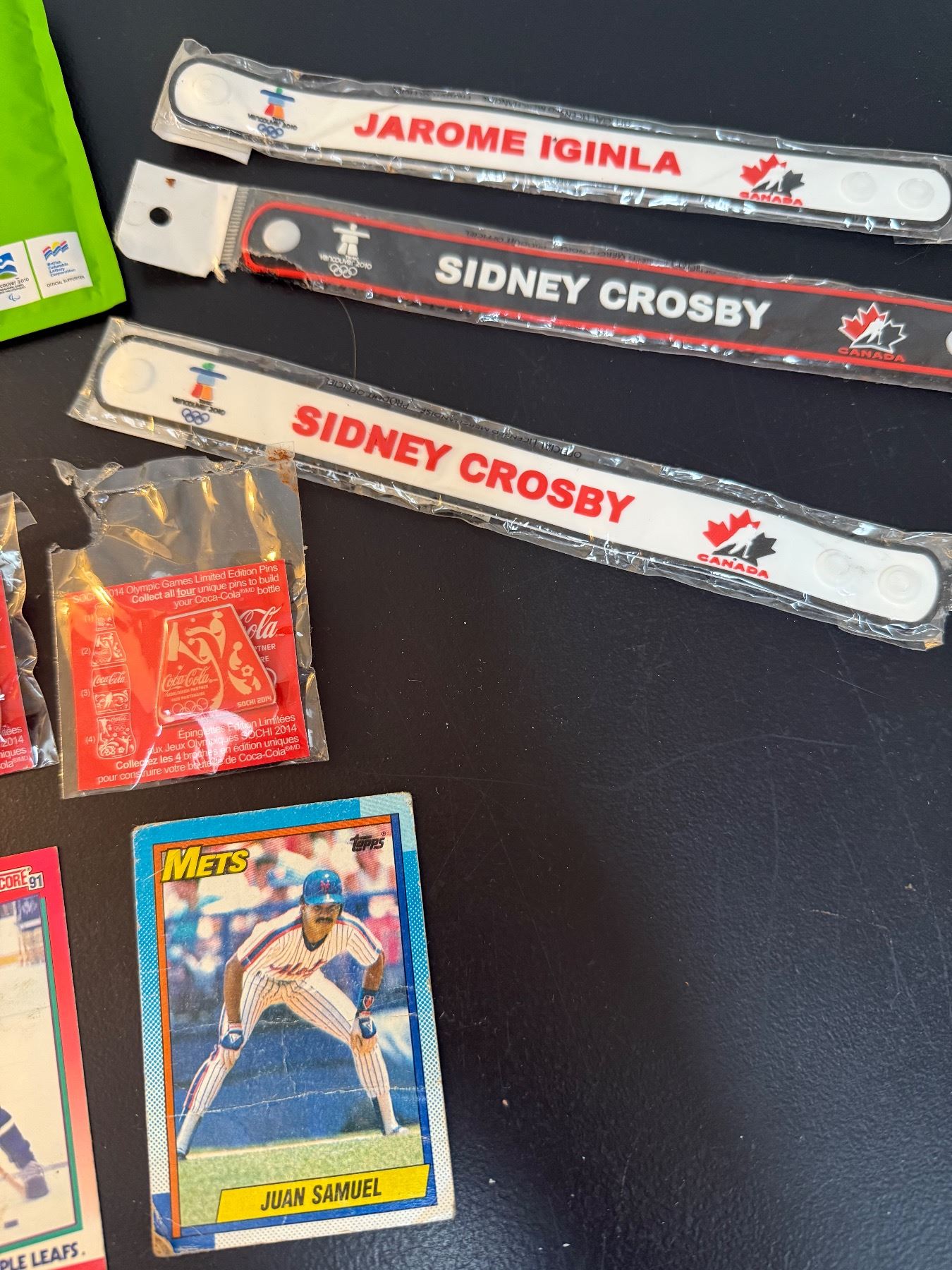 Assorted sports lot 2010 Olympics baseball card hockey card pins