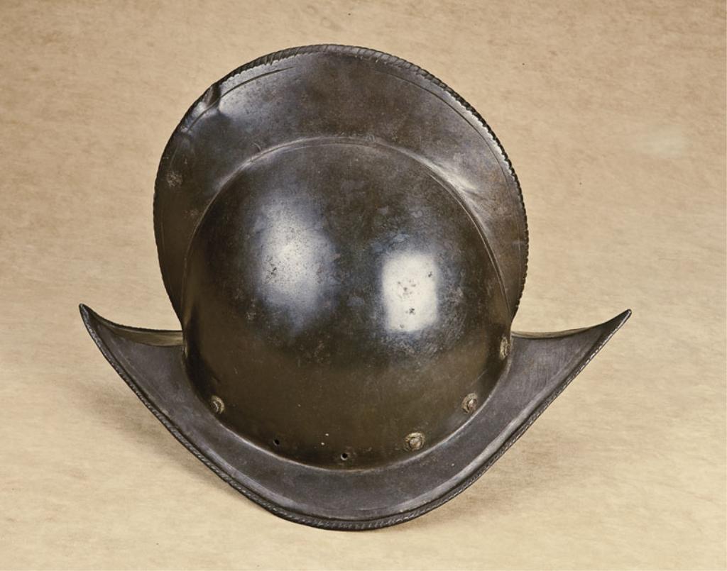 Late 16th to mid 17th century Moorian helmet, blued steel, with brass ...