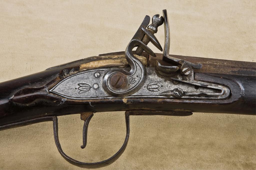 Early flintlock Indian trade gun with serpent brass side plate, .60 cal ...